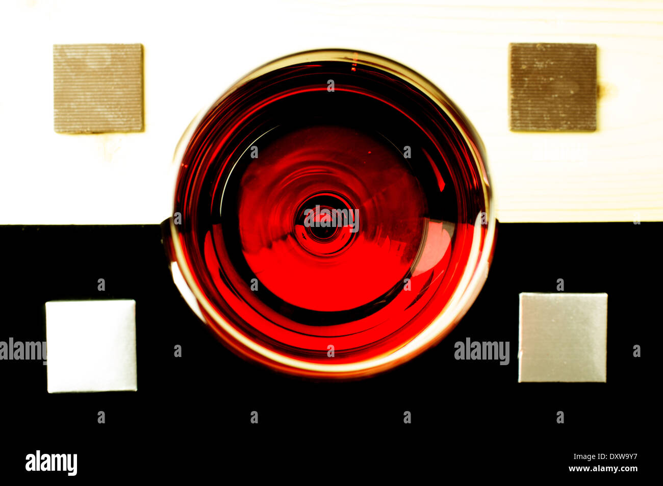 Glass of red wine on a contrasting black-and-white middle. Background ...