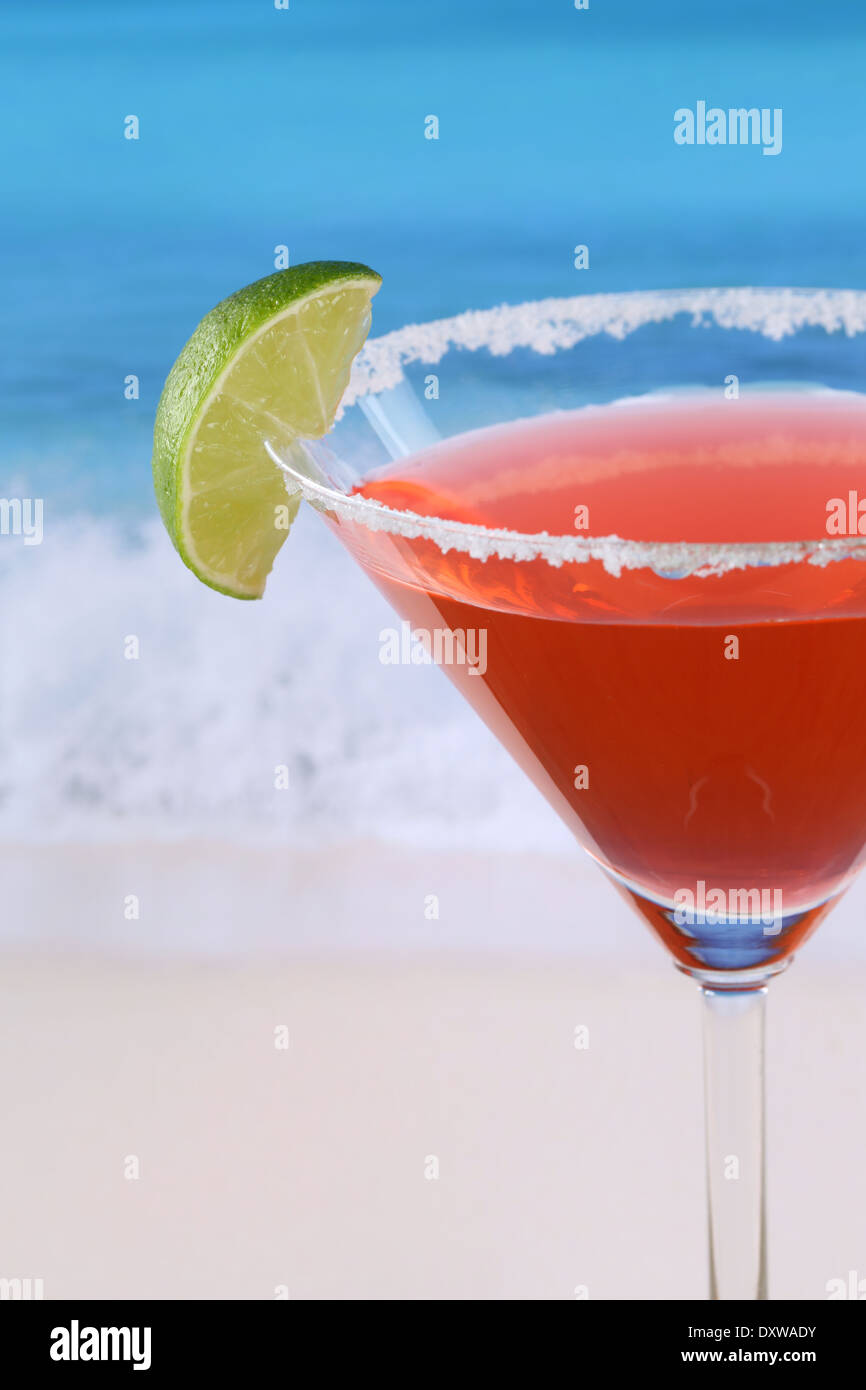 Close up red Martini cocktail on the beach while on vacation Stock ...