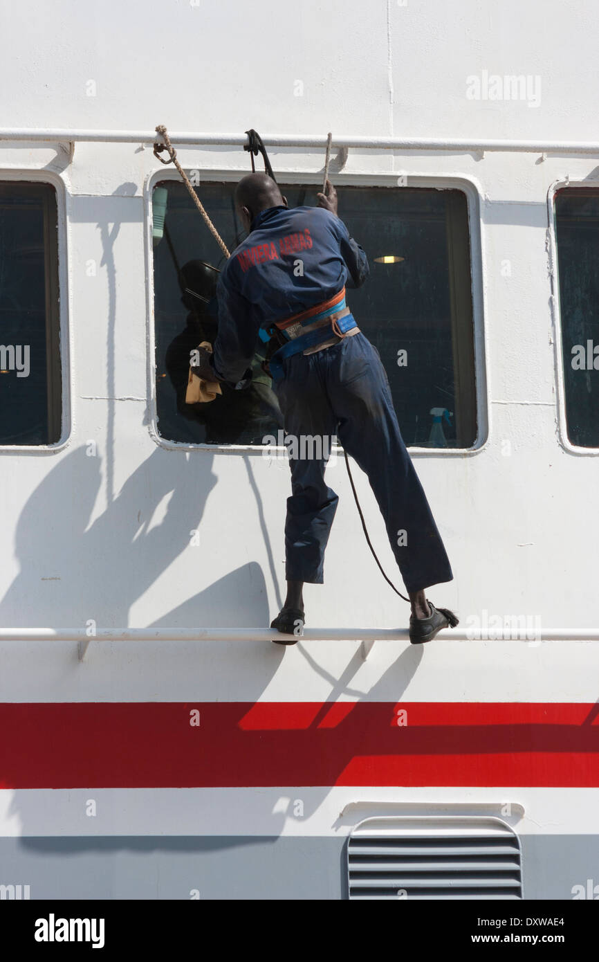 Cleaning windows on ferry in Canary Islands Stock Photo - Alamy