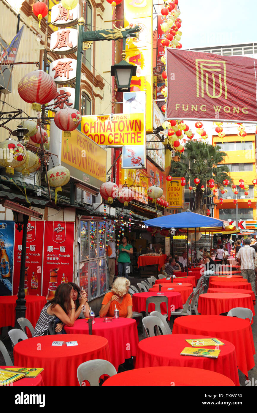 Red colored restaurant tables in Chinatown as the lunch rush begins in ...