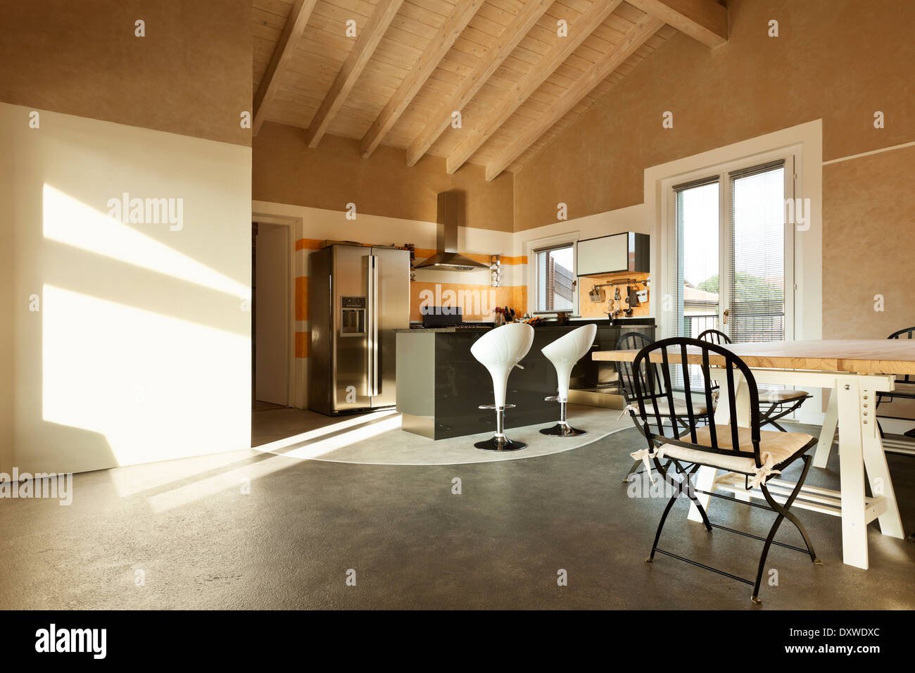 interior, new loft furnished, view of dining table and kitchen Stock ...