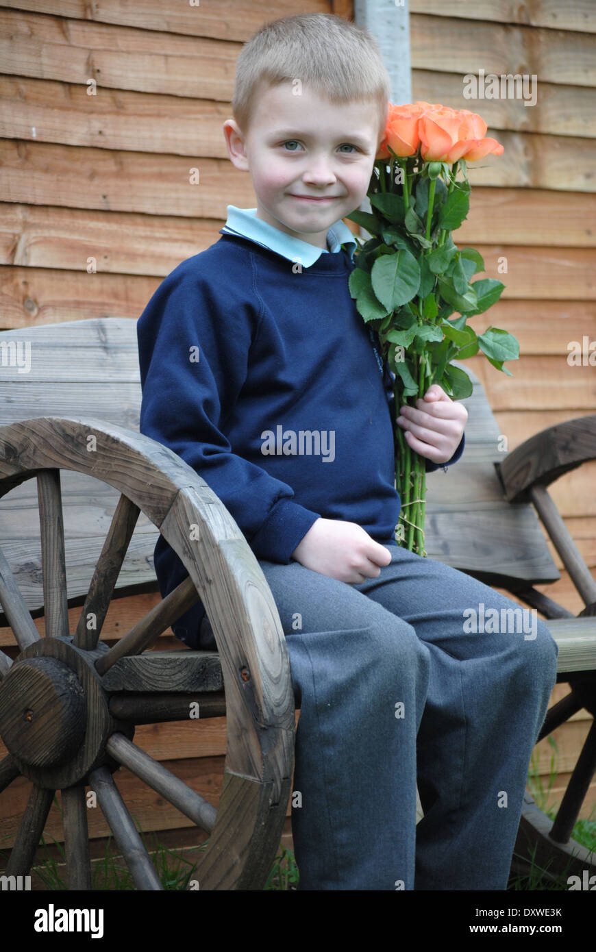 Boy With Roses High Resolution Stock Photography and Images - Alamy