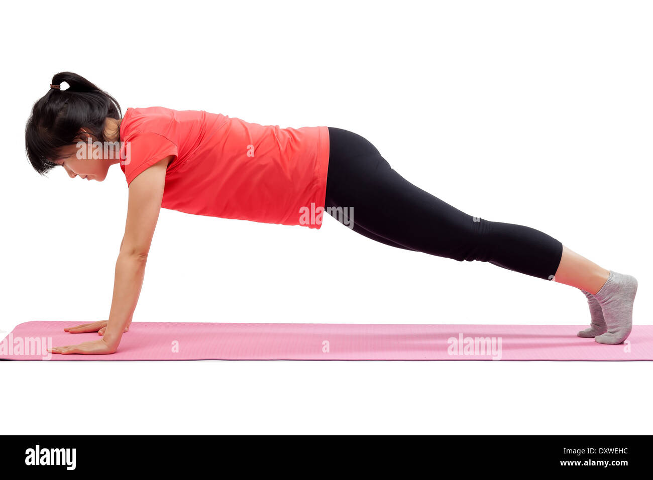 Woman exercising with push up pose isolated on white background Stock ...