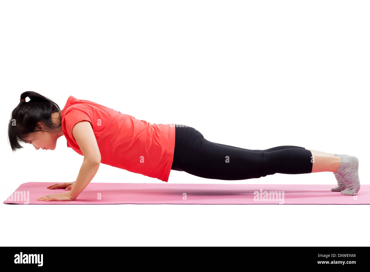 Woman doing push up workout isolated on white background Stock Photo ...
