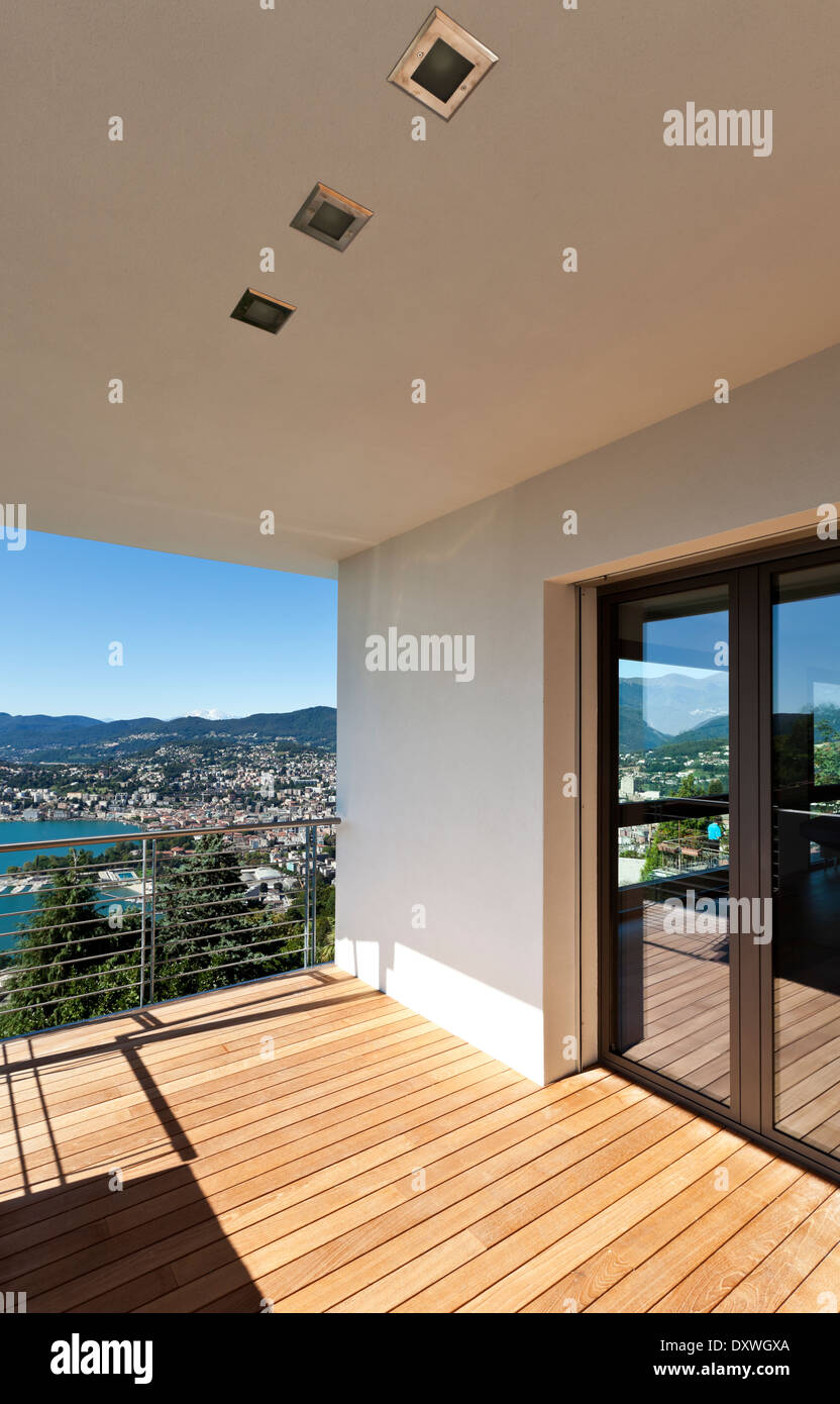 Modern apartment, balcony overlooking the lake Stock Photo - Alamy