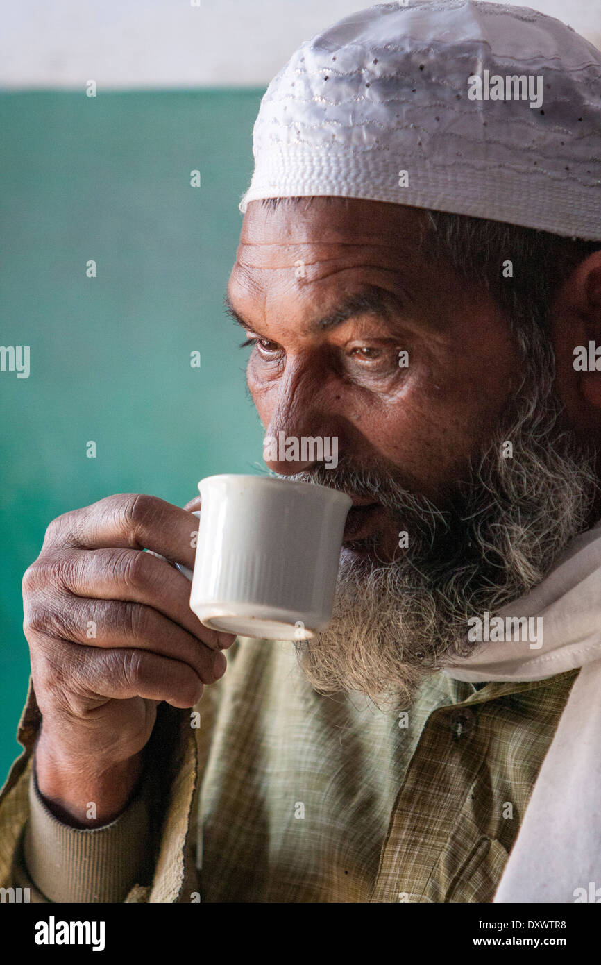 India, Dehradun. Indian Man Enjoying a Cup of Coffee Stock Photo - Alamy