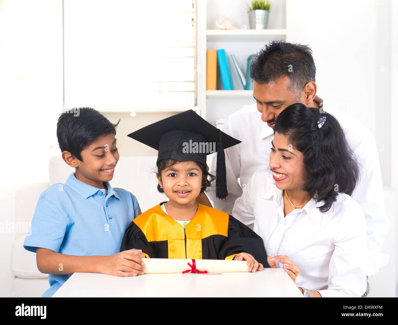 Happy indian family graduation, education concept photo Stock Photo - Alamy