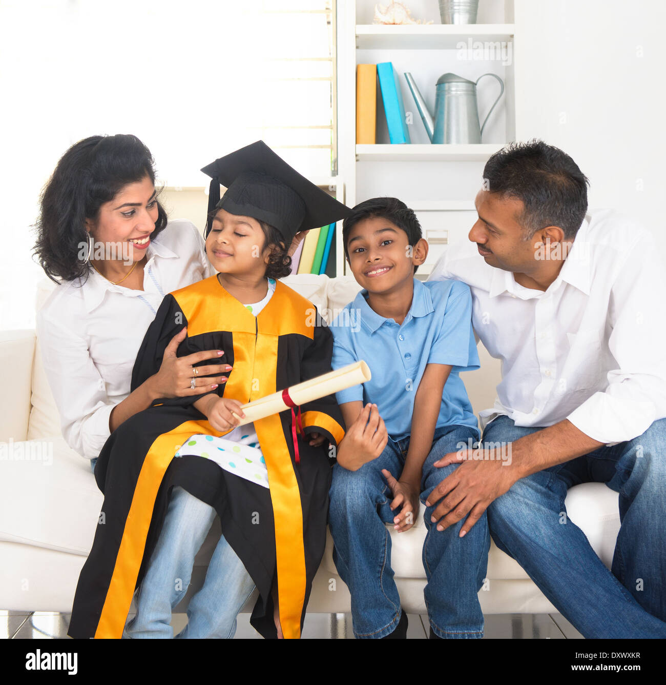 Happy indian family graduation, education concept photo Stock Photo - Alamy