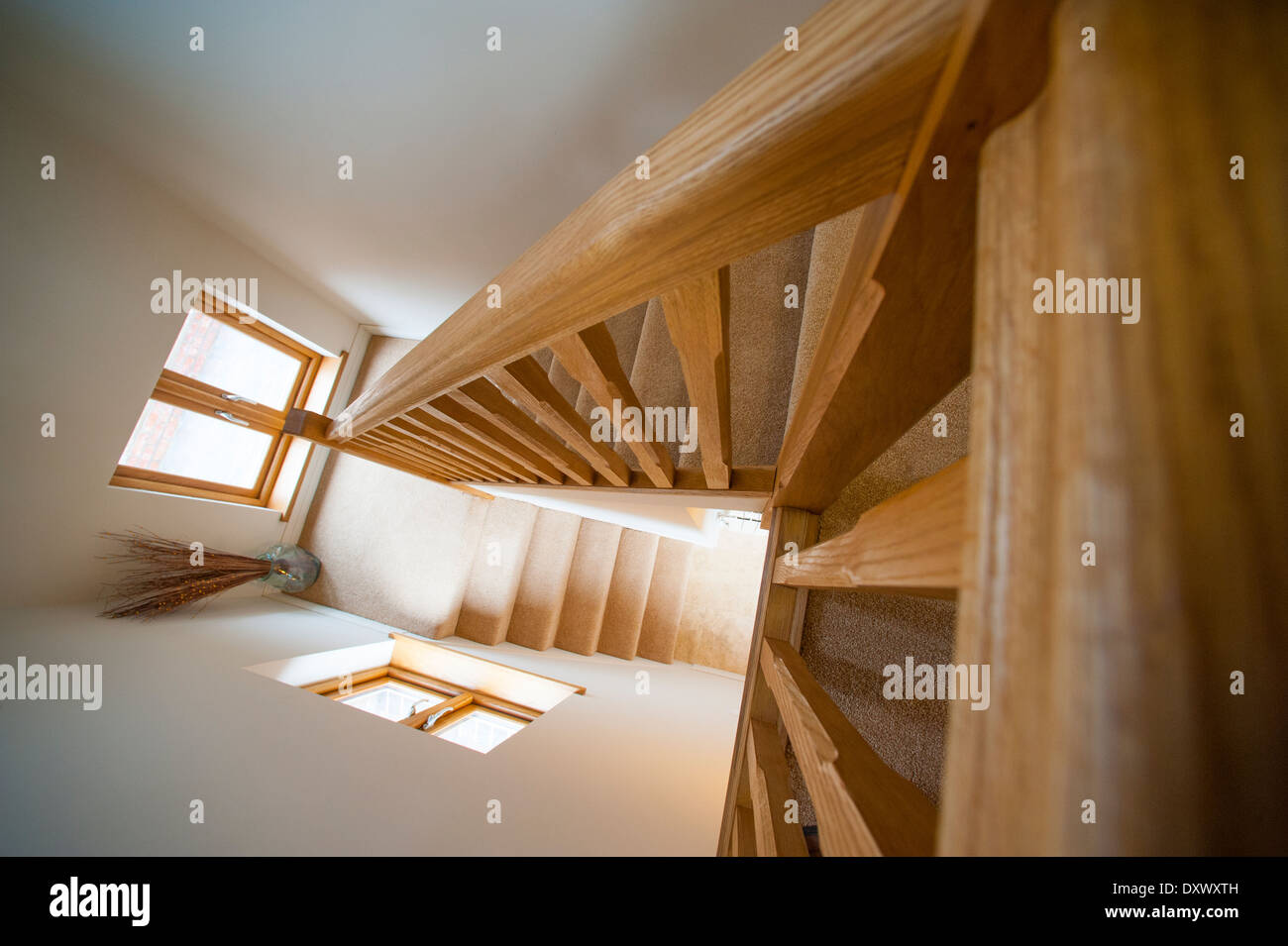 Looking down some stairs in a modern home Stock Photo - Alamy