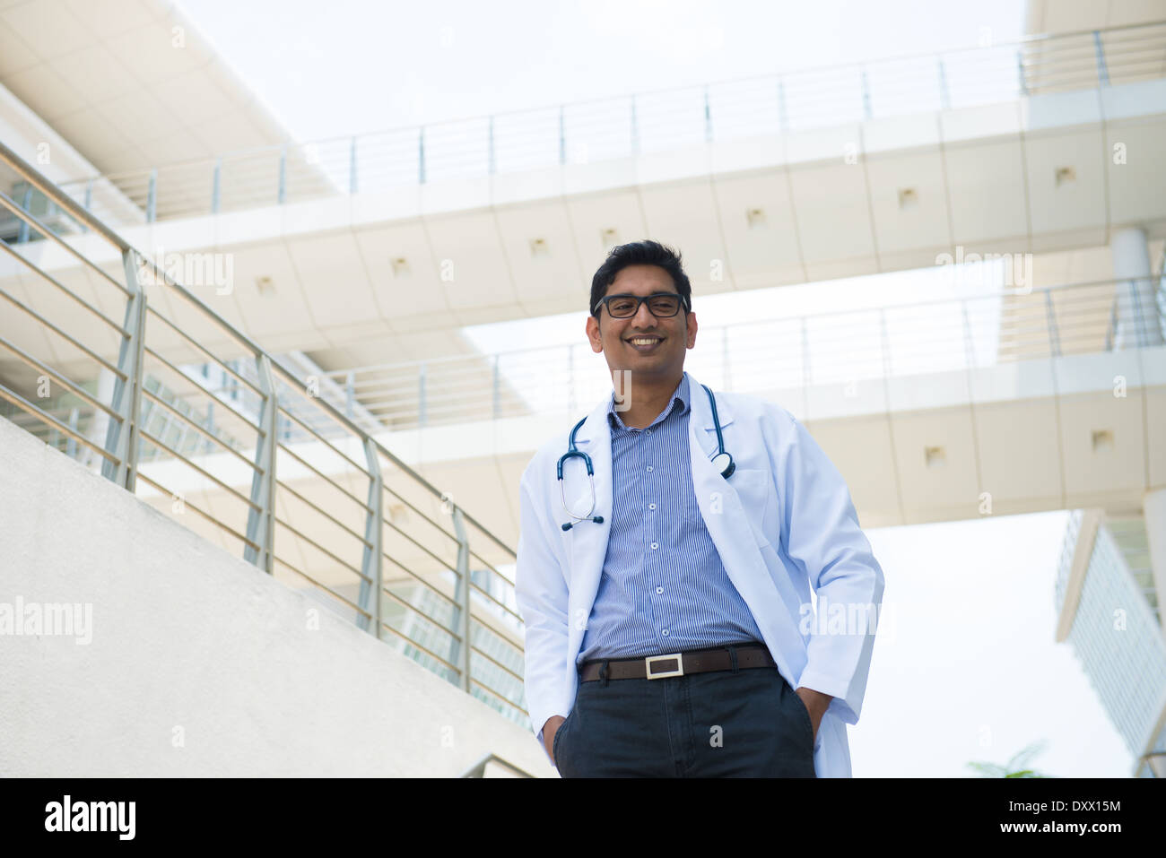 indian male doctor with hospital background Stock Photo - Alamy