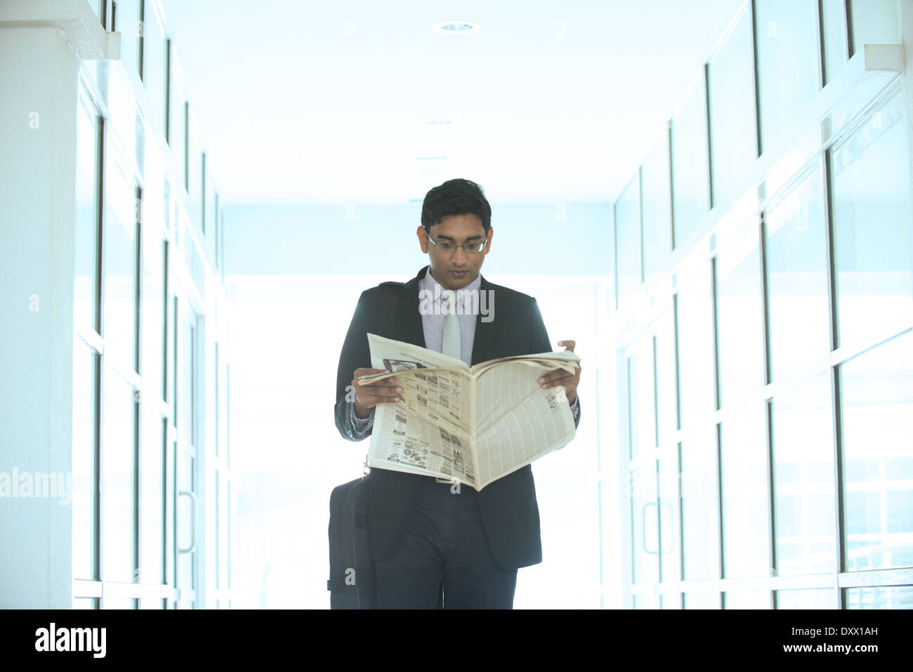 Indian businessman walking hi-res stock photography and images - Alamy