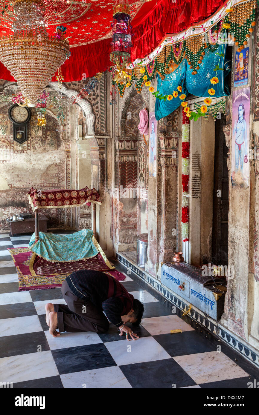 India, Dehradun. Young Man Praying at the Durbar Shri Guru Ram Rai Ji ...