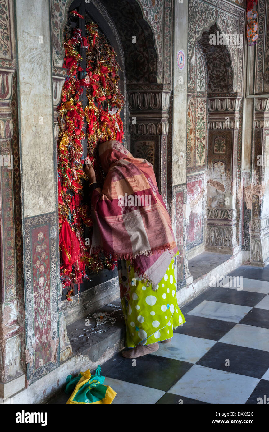 India, Dehradun. A Women Praying at the Sikh Durbar Shri Guru Ram Rai ...