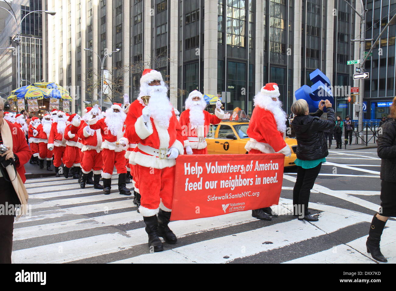 More than 50 fully dressed Santas attended the 110th Annual Sidewalk ...