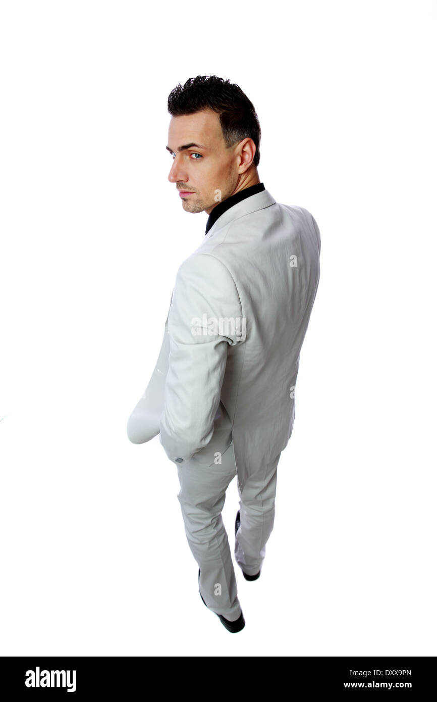 Back view portrait of a handsome businessman isolated on a white ...