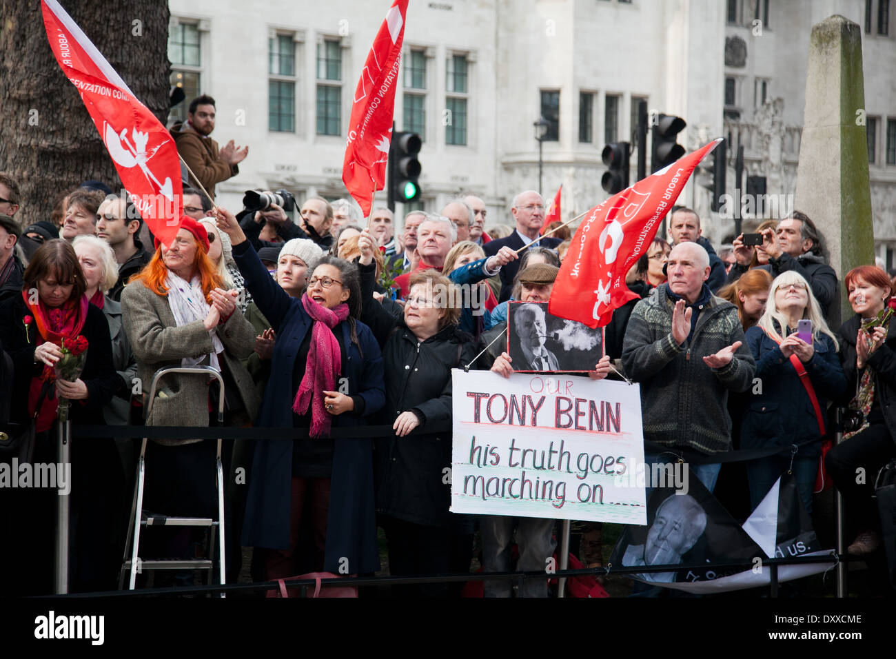 Mourners cheer and clap showing their respect for at the end of the ...