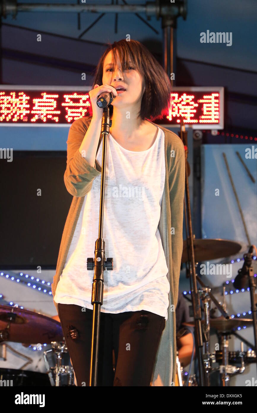 Taipei. 30th Mar, 2014. Singer Faith Yang performs at ROCKBANDOH in ...