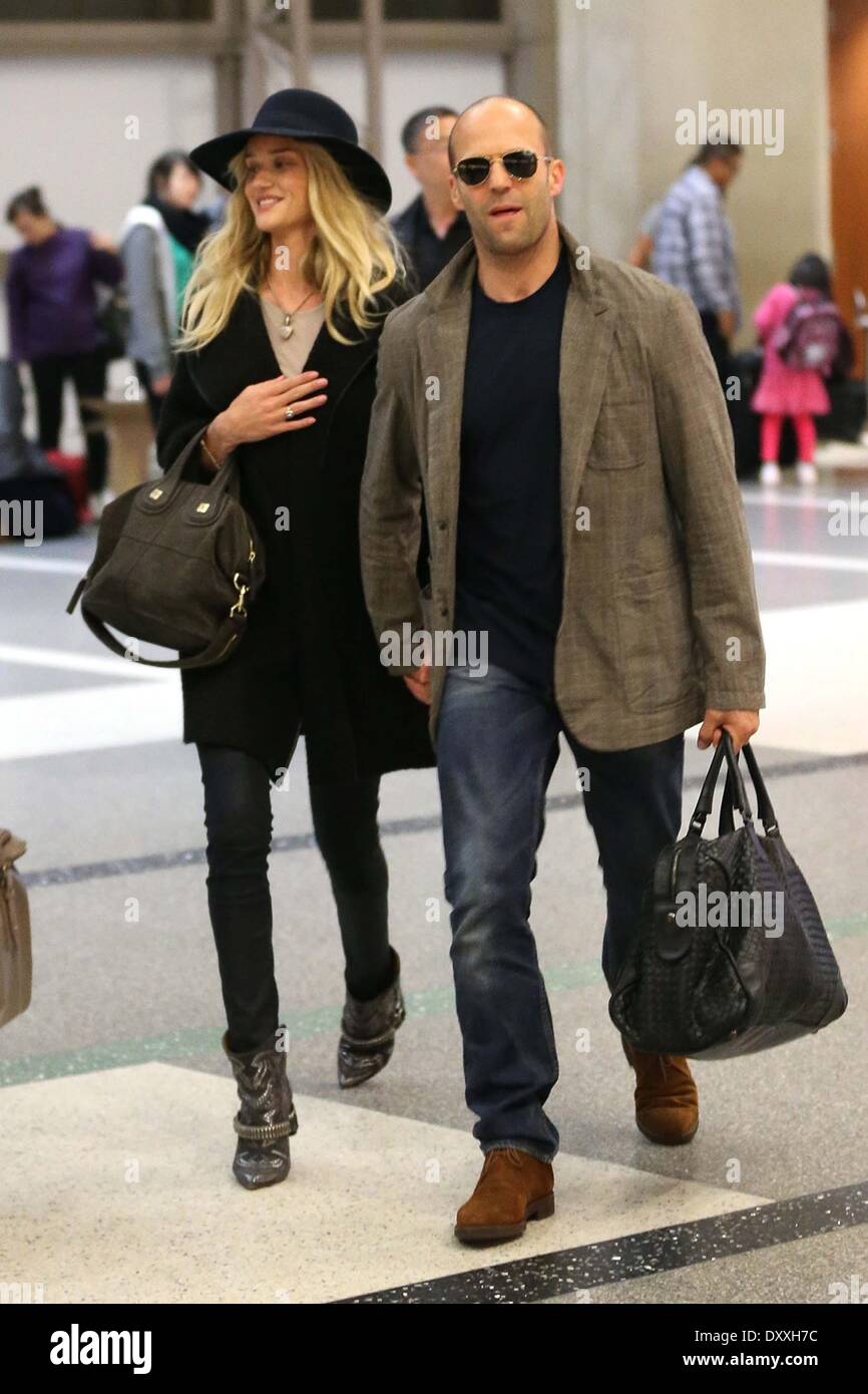 Jason Statham and girlfriend Rosie Huntington-Whiteley arrives at LAX ...