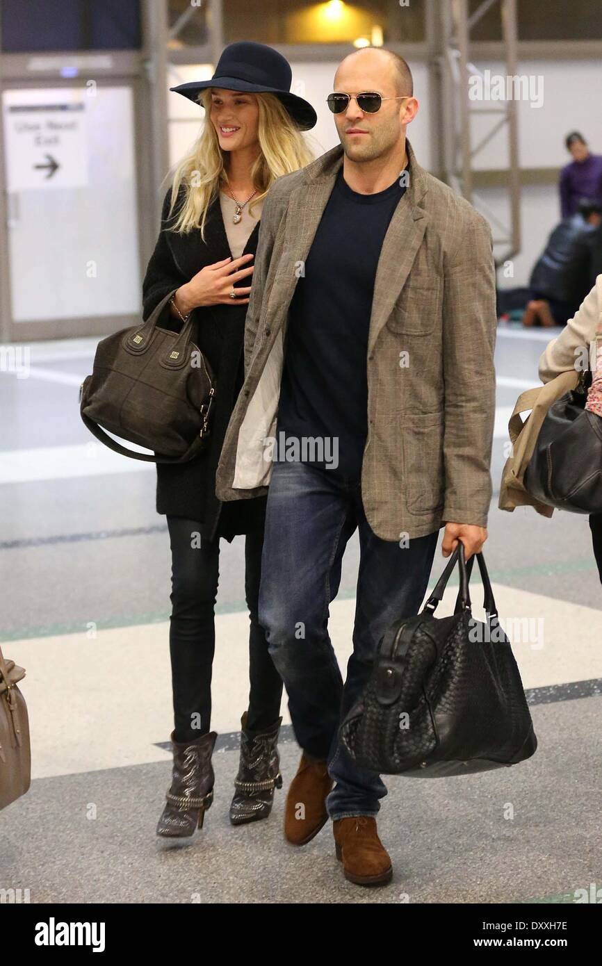 Jason Statham and girlfriend Rosie Huntington-Whiteley arrives at LAX ...
