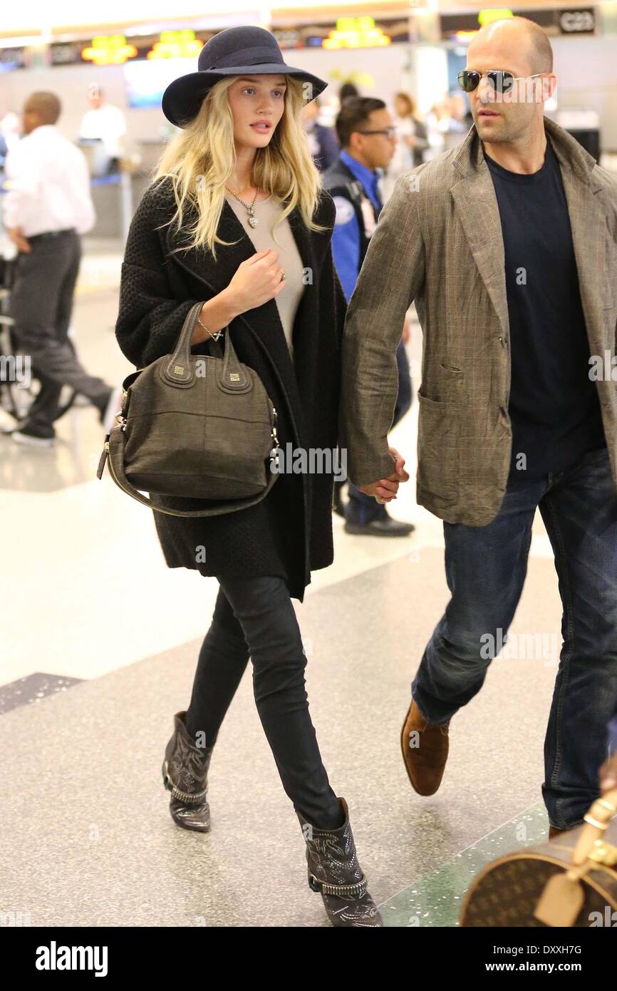Jason Statham and girlfriend Rosie Huntington-Whiteley arrives at LAX ...