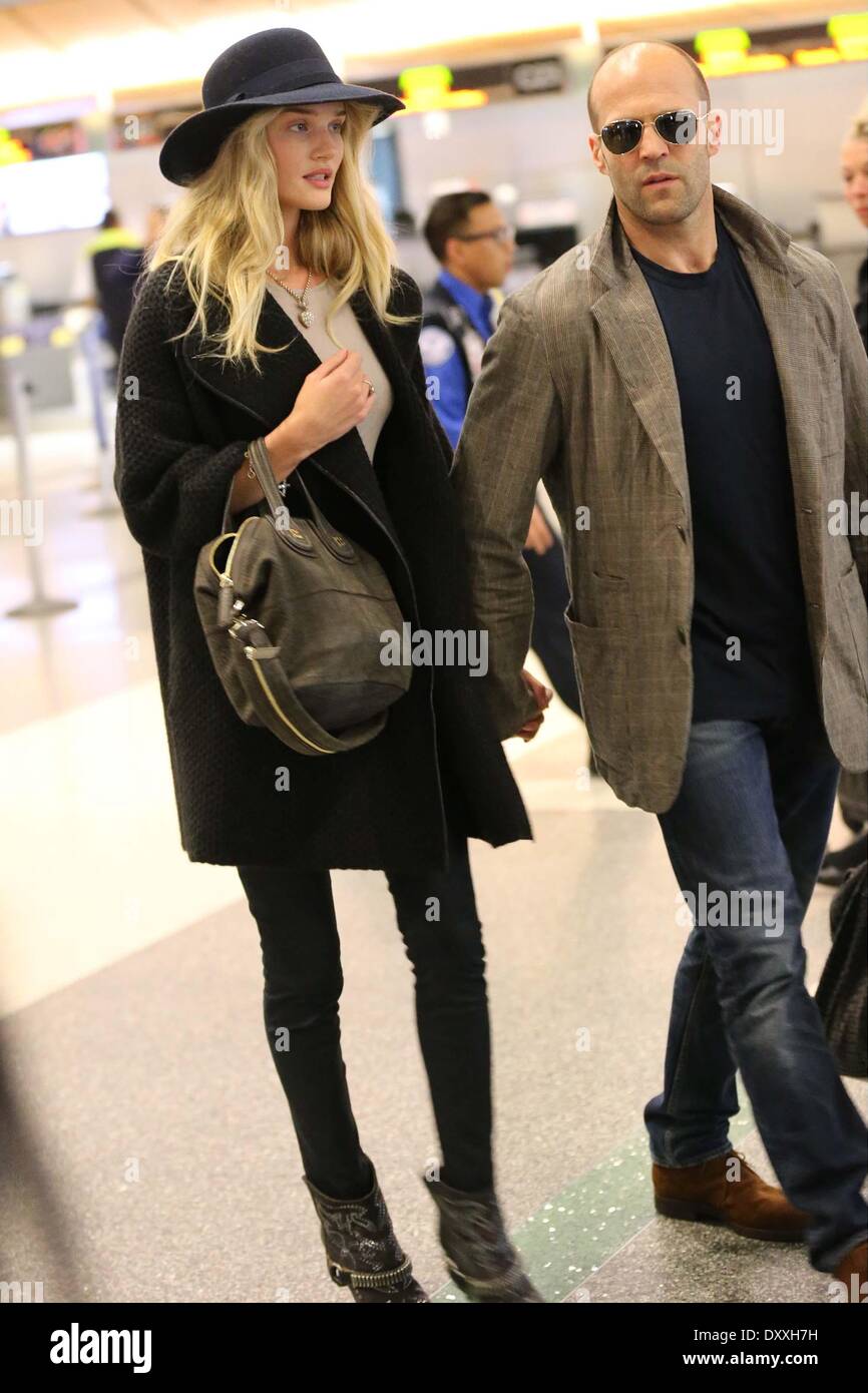 Jason Statham and girlfriend Rosie Huntington-Whiteley arrives at LAX ...