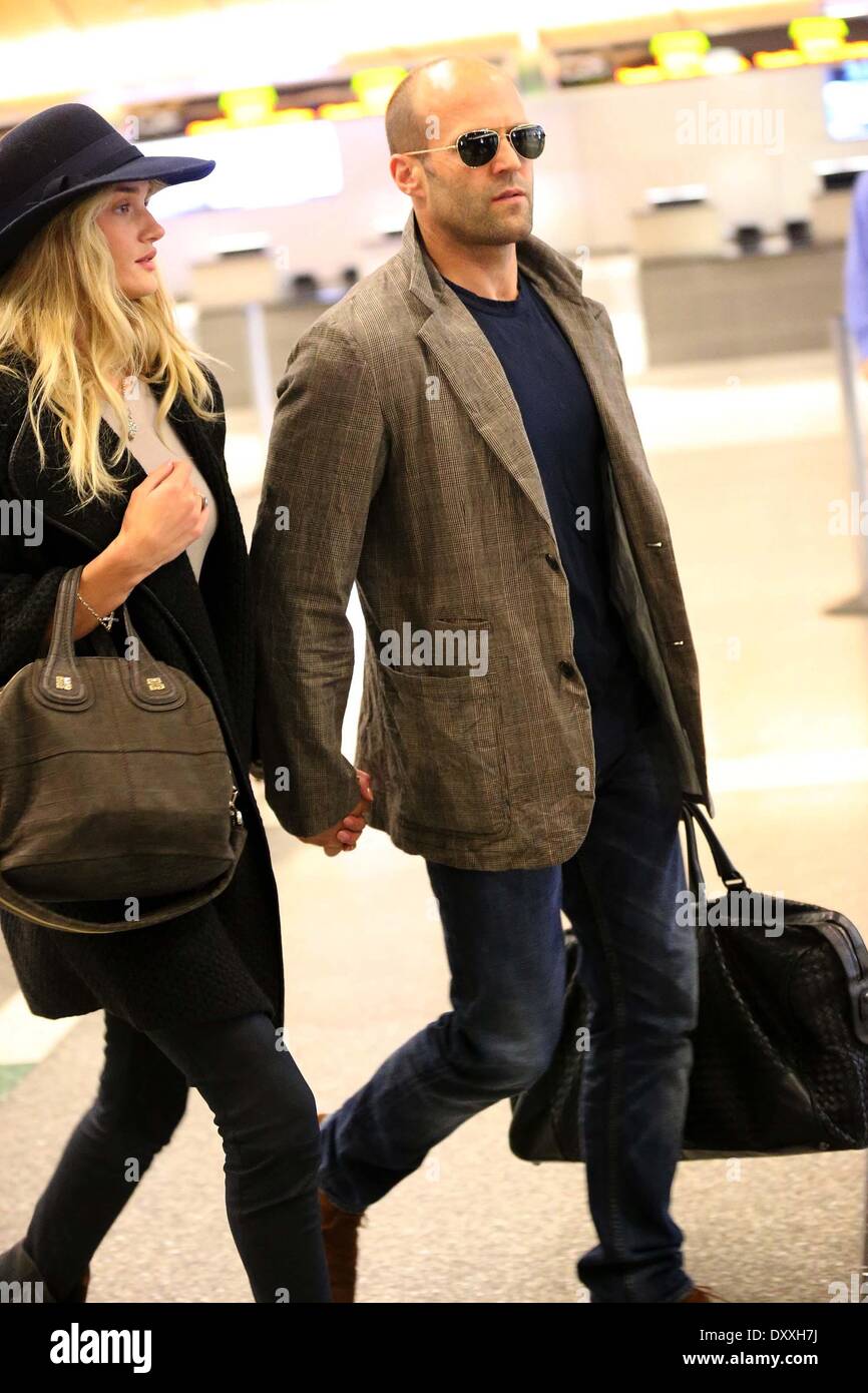 Jason Statham and girlfriend Rosie Huntington-Whiteley arrives at LAX ...