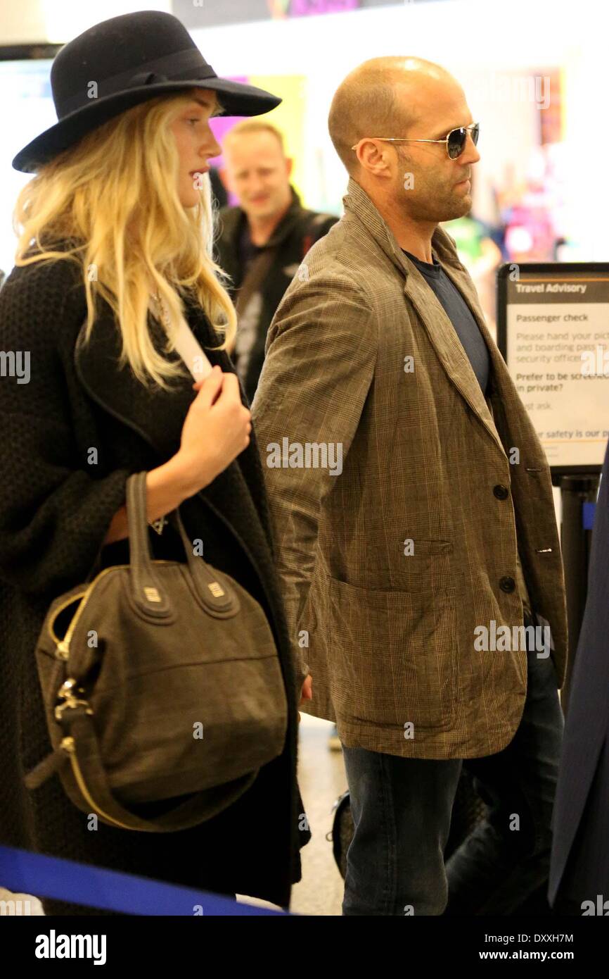 Jason Statham and girlfriend Rosie Huntington-Whiteley arrives at LAX ...