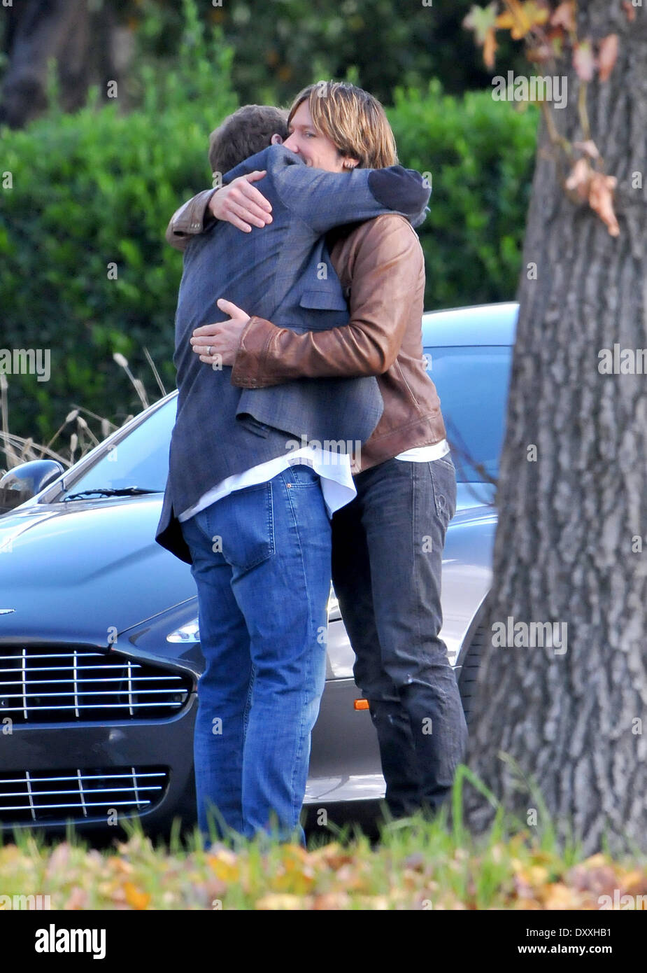 Keith Urban hugging a friend as he arrives to film an episode of ...