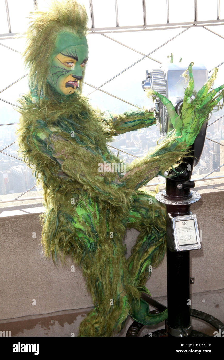 Actor Jeff McCarthy as The Grinch visits The Empire State Building ...