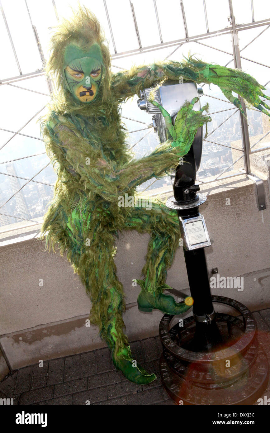 Actor Jeff McCarthy as The Grinch visits The Empire State Building ...