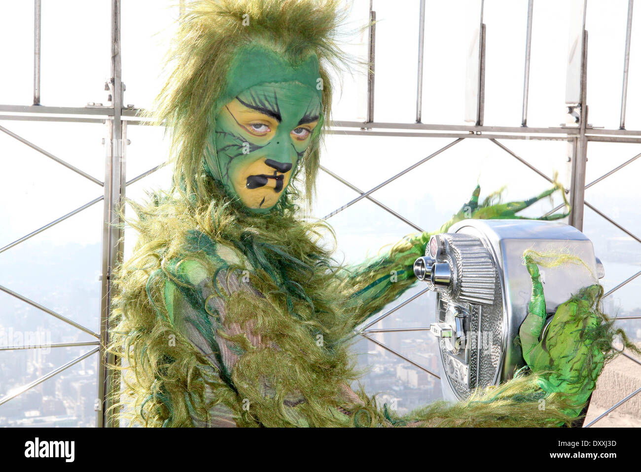 Actor Jeff McCarthy as The Grinch visits The Empire State Building ...