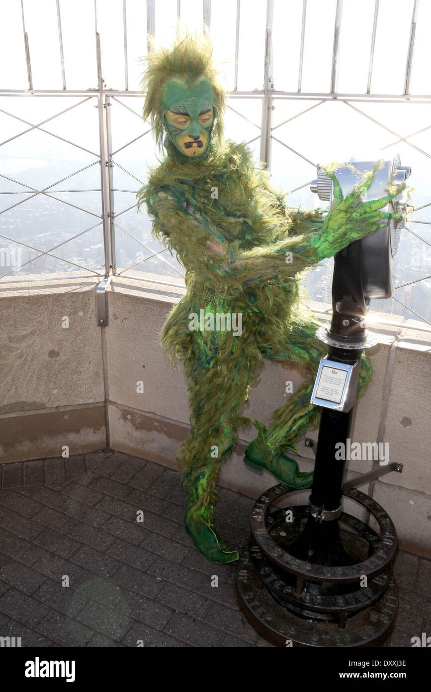 Actor Jeff McCarthy as The Grinch visits The Empire State Building ...