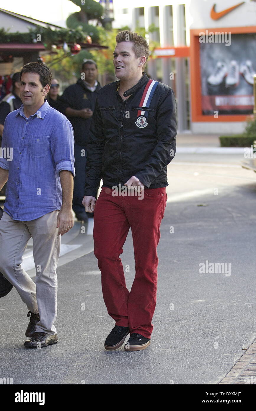 Sugar Ray's lead singer Mark McGrath seen carrying a guitar case and on ...