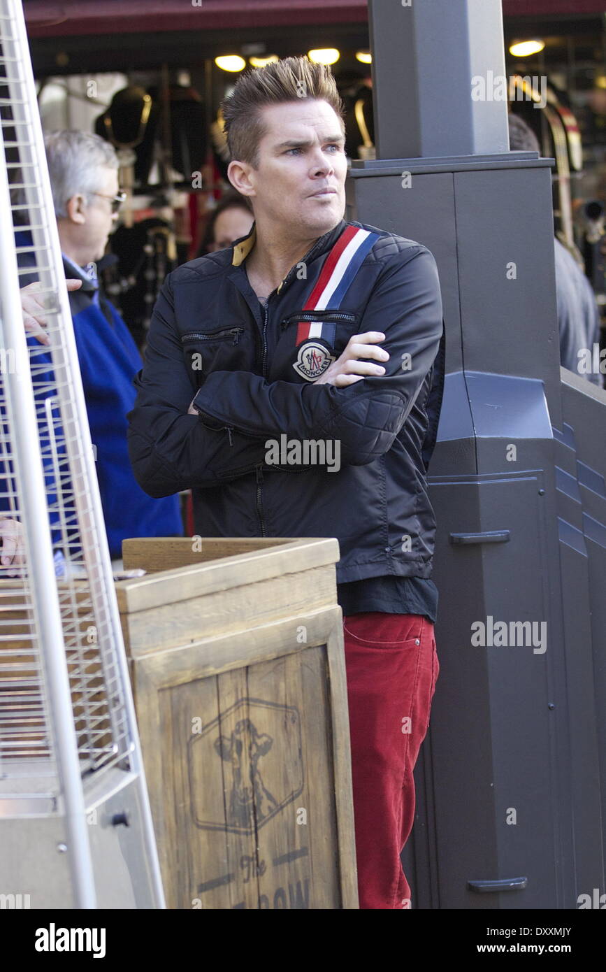 Sugar Ray's lead singer Mark McGrath seen carrying a guitar case and on ...
