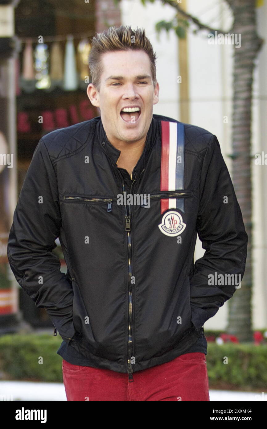 Sugar Ray's lead singer Mark McGrath seen carrying a guitar case and on ...