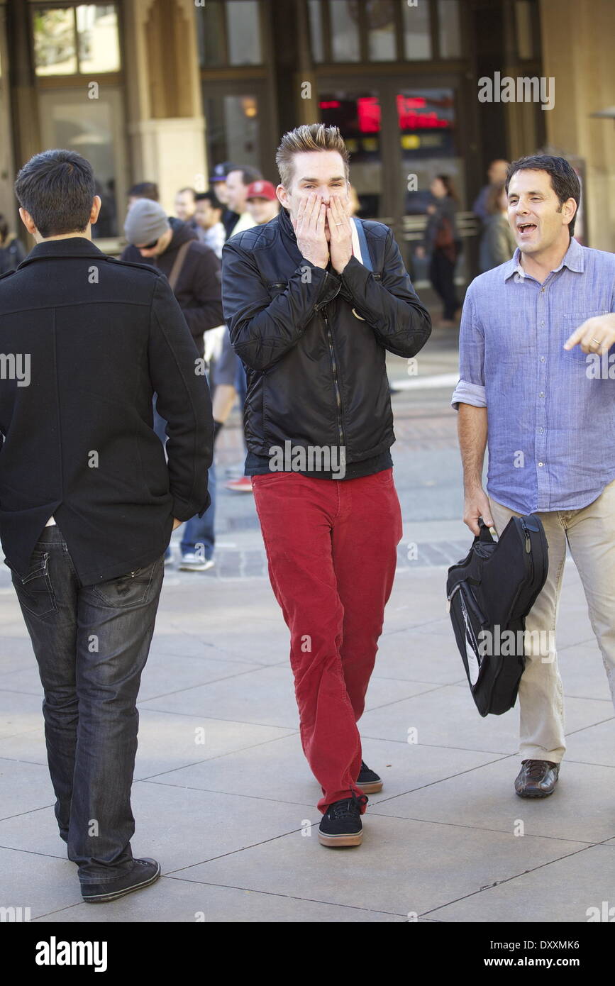 Sugar Ray's lead singer Mark McGrath seen carrying a guitar case and on ...