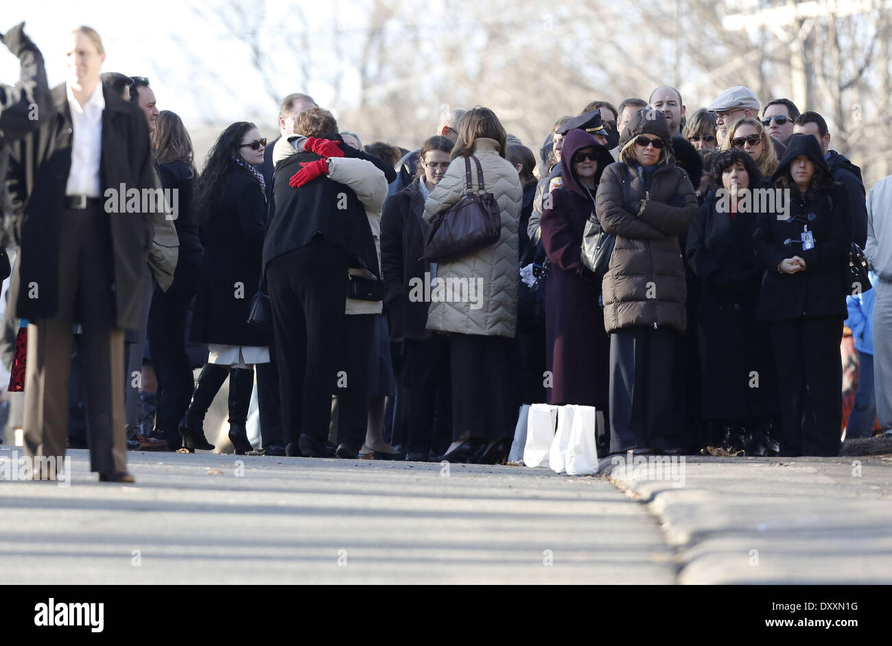 Mourners gather outside Muson Lovetere Funeral Home for Sandy Hook ...