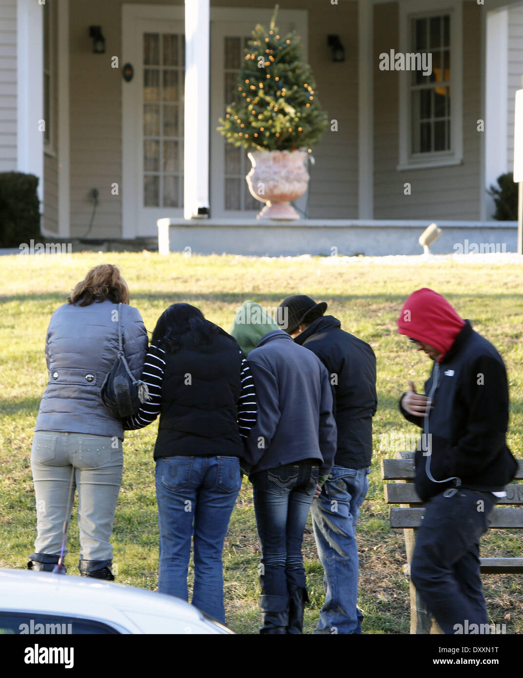 Mourners gather outside Muson Lovetere Funeral Home for Sandy Hook ...