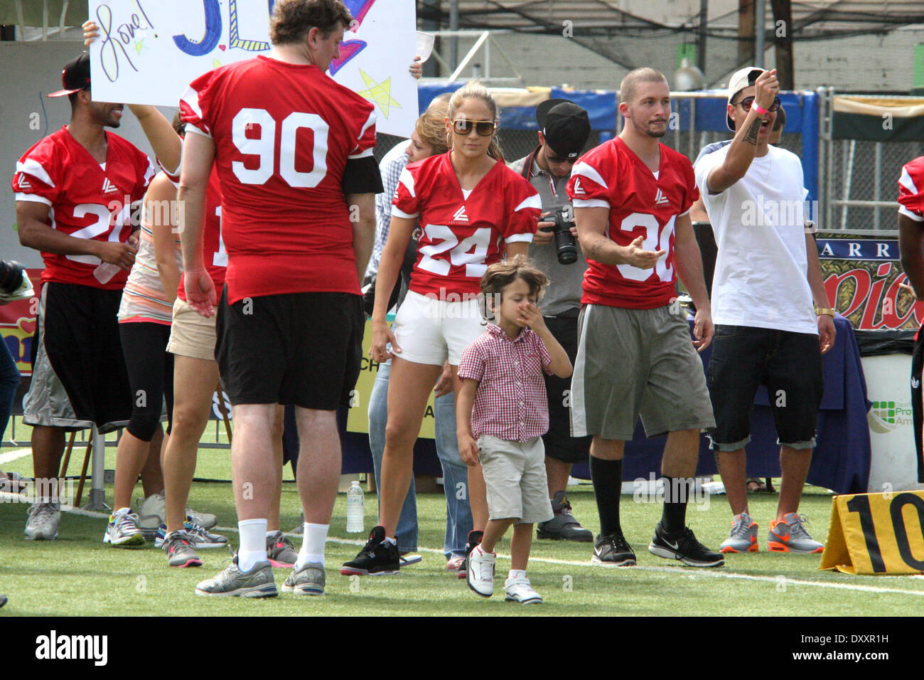Jennifer Lopez Max Muniz Jennifer Lopez plays a football game at a ...