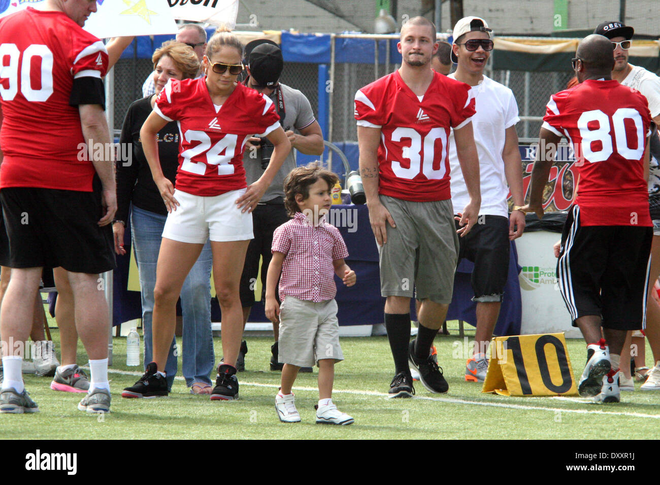 Jennifer Lopez Max Muniz Jennifer Lopez plays a football game at a ...