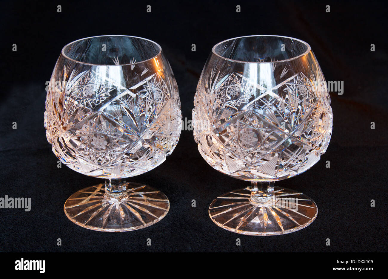 two crystal goblets on black background Stock Photo - Alamy