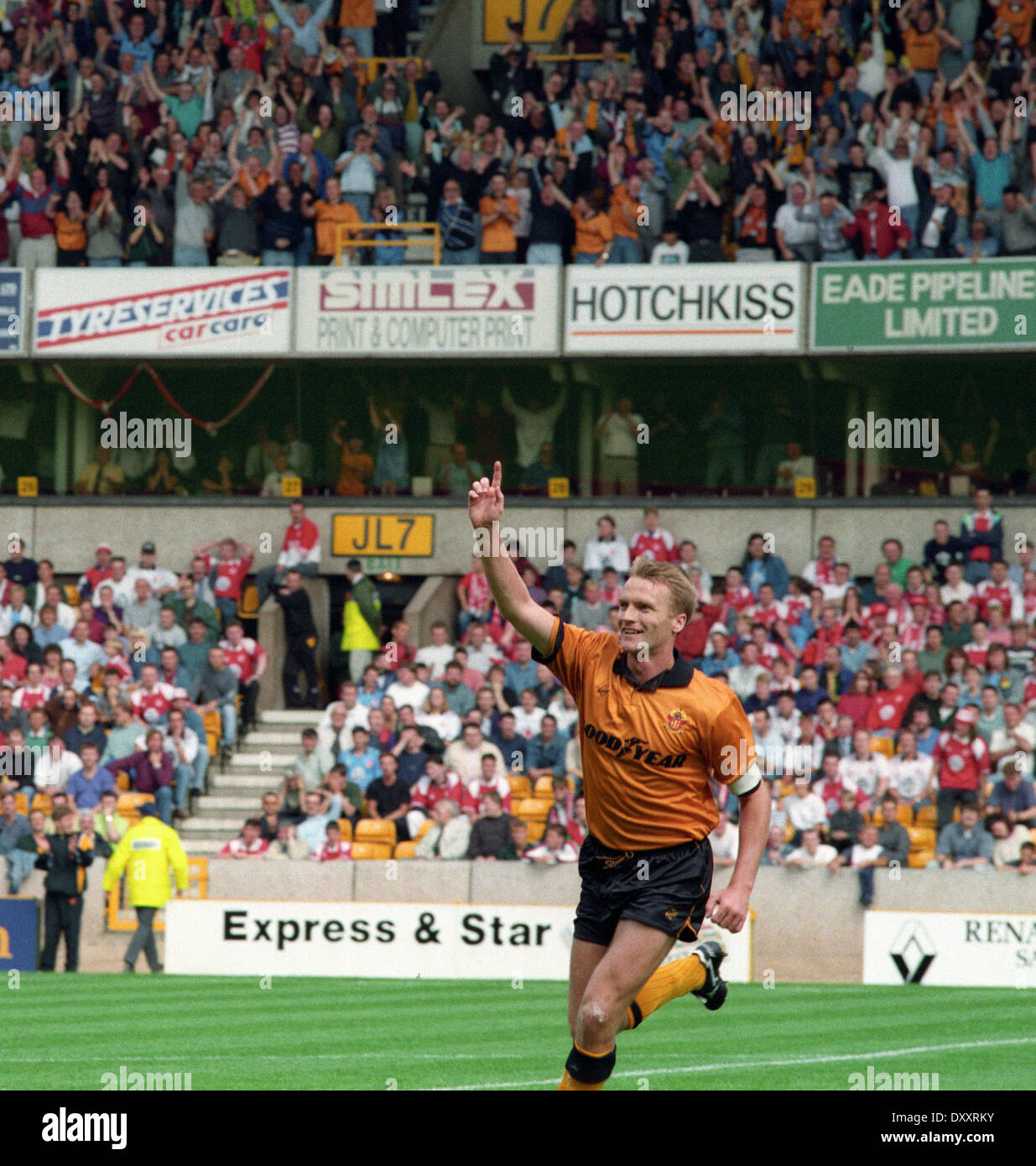 Footballer Geoff Thomas celebrates after scoring goal Wolverhampton ...
