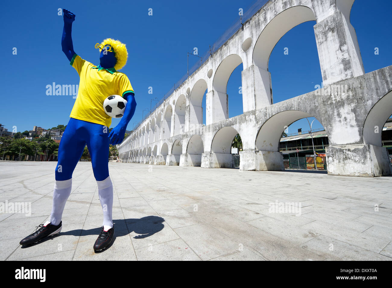 Blue Brazilian Football Player Holding Soccer Ball Rio Stock Photo - Alamy