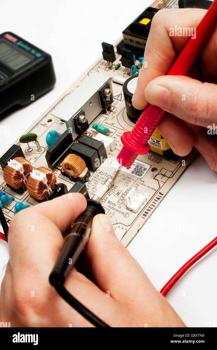 Testing a fuse on a pcb Stock Photo - Alamy