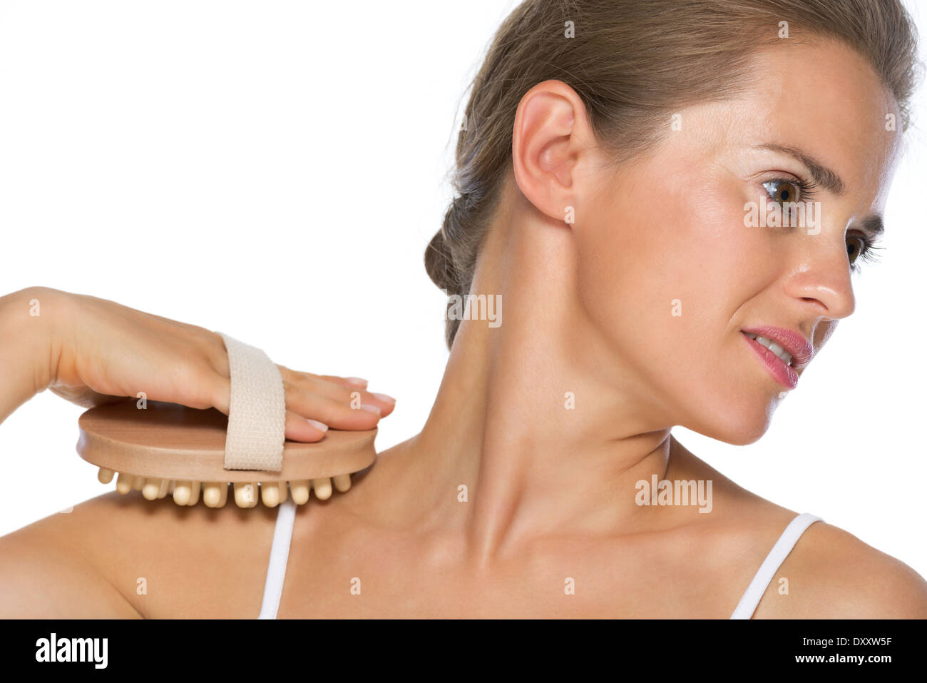 Young woman using massager Stock Photo - Alamy