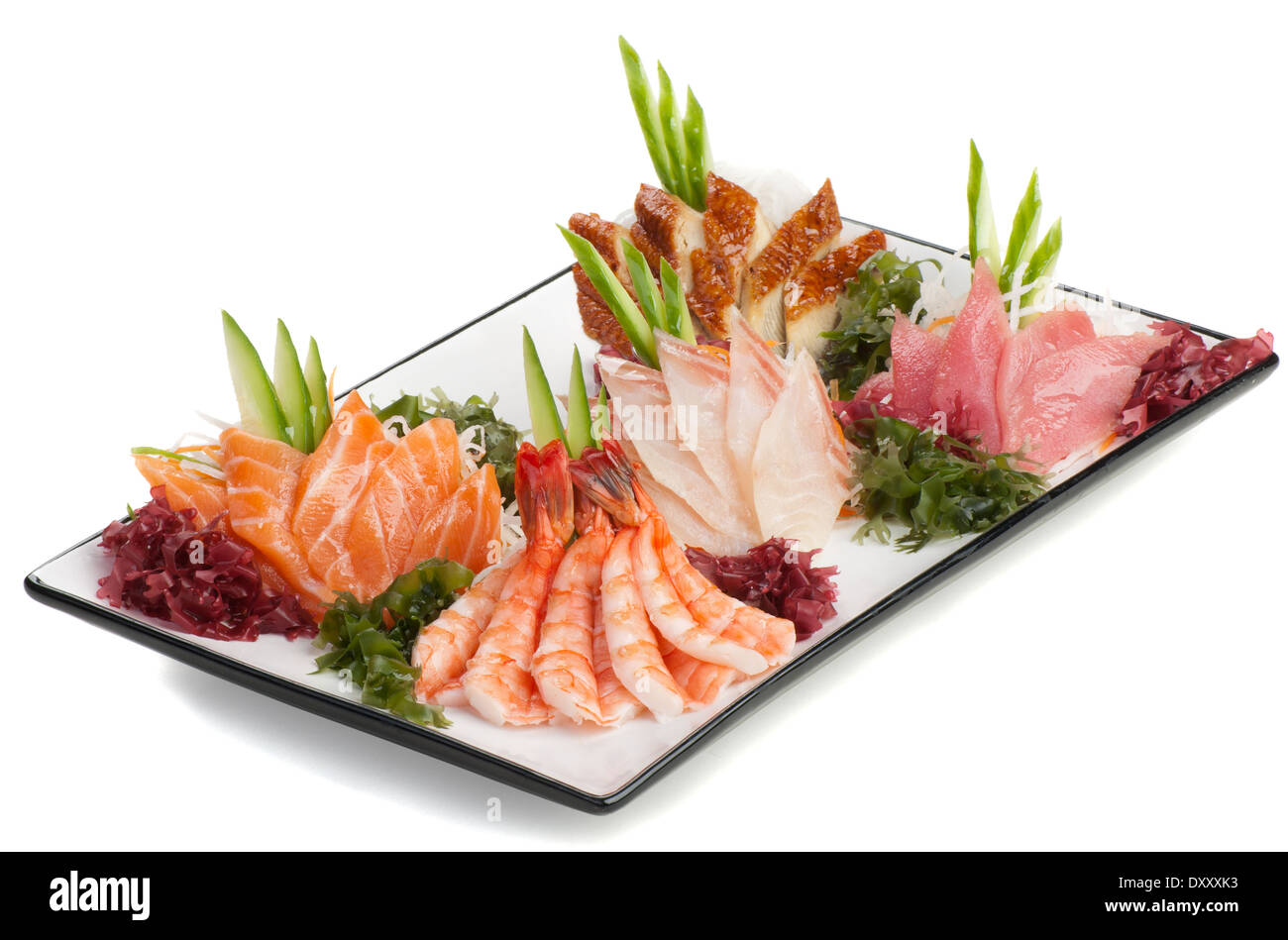 Set of Sashimi on Daikon (White Radish). Garnished with Ginger, Seaweed ...
