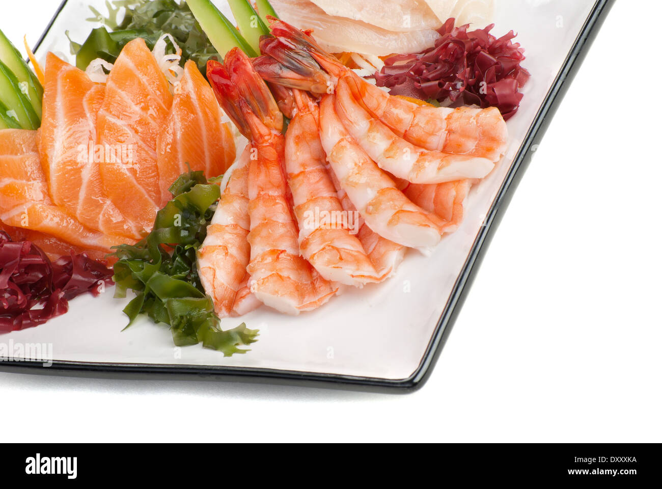 Set of Sashimi on Daikon (White Radish). Garnished with Ginger, Seaweed ...
