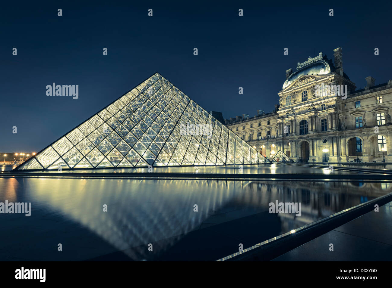 Louvre pyramid at night hi-res stock photography and images - Alamy