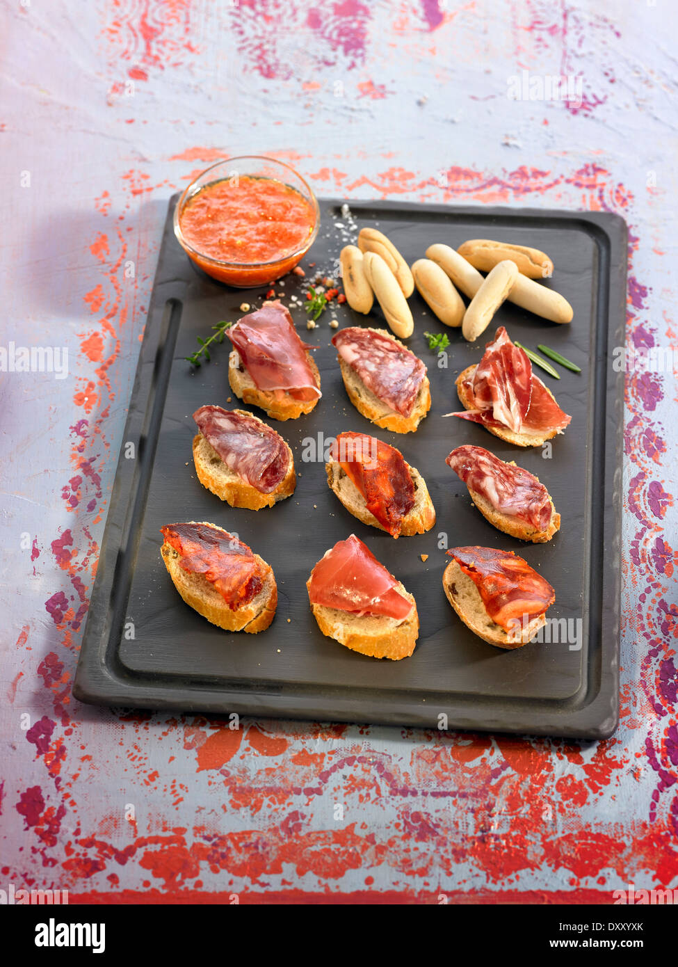 Spanish cold cuts on sliced bread Stock Photo - Alamy