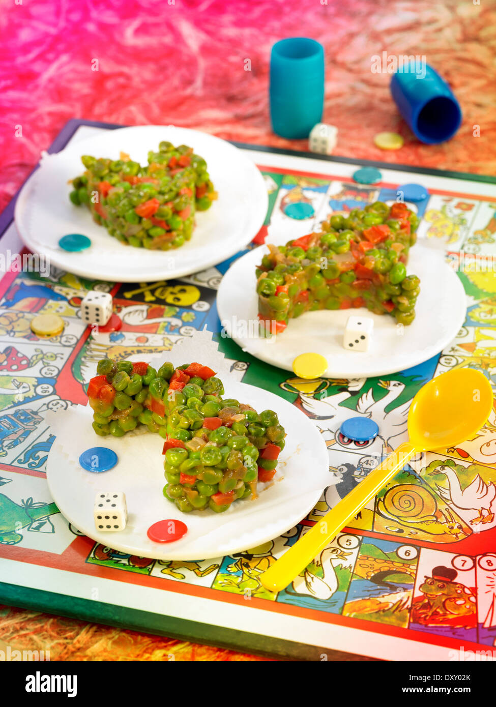 Animal-shaped pea dishes for kids Stock Photo - Alamy